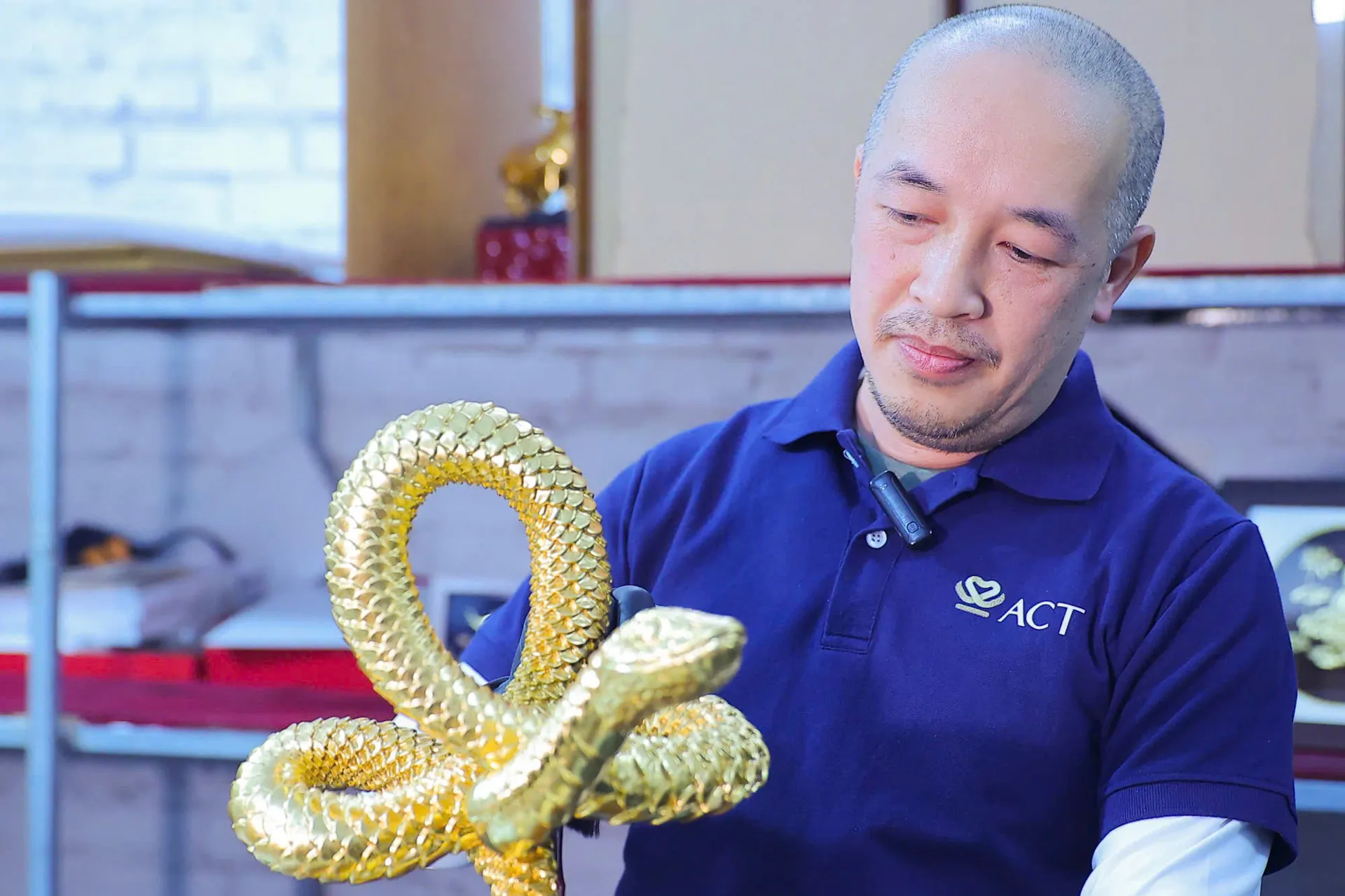 A glimpse of the 24K gold Lunar New Year 2025 Snake Mascot
